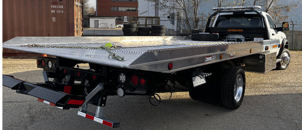 2024 Dodge 5500 4 X 4 with a Jerr-Dan 96" X 20Ft aluminum deck – Tow Shop